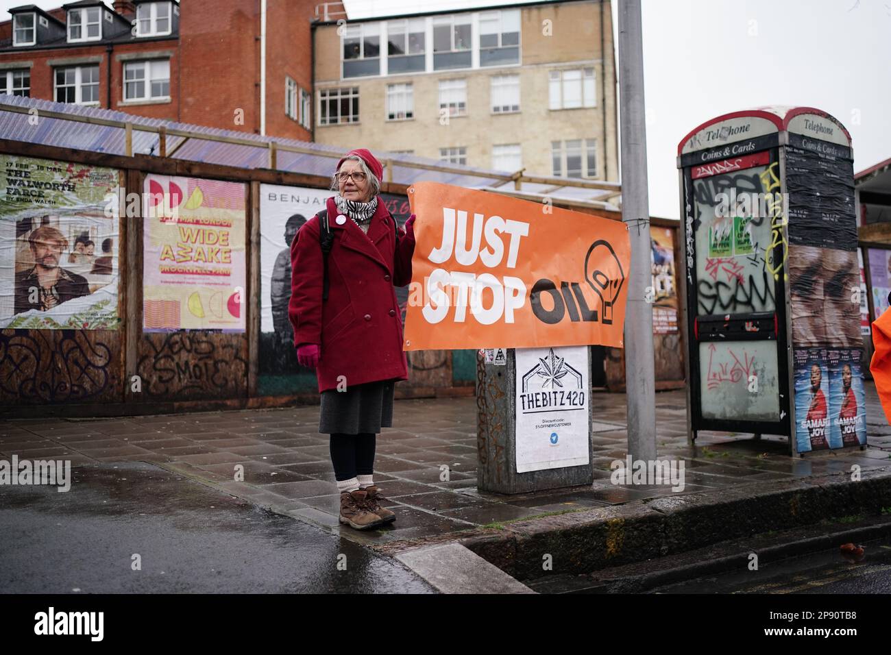 Insulate Britain supporters protest near Inner London Crown Court ...