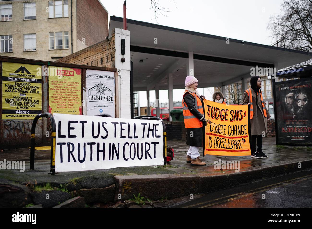 Insulate Britain supporters protest near Inner London Crown Court ...
