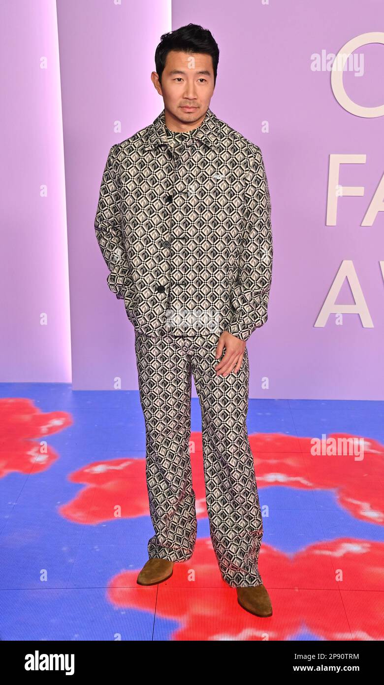 Hollywood, CA. March 9, 2023, Simu Liu arriving at the Green Carpet ...
