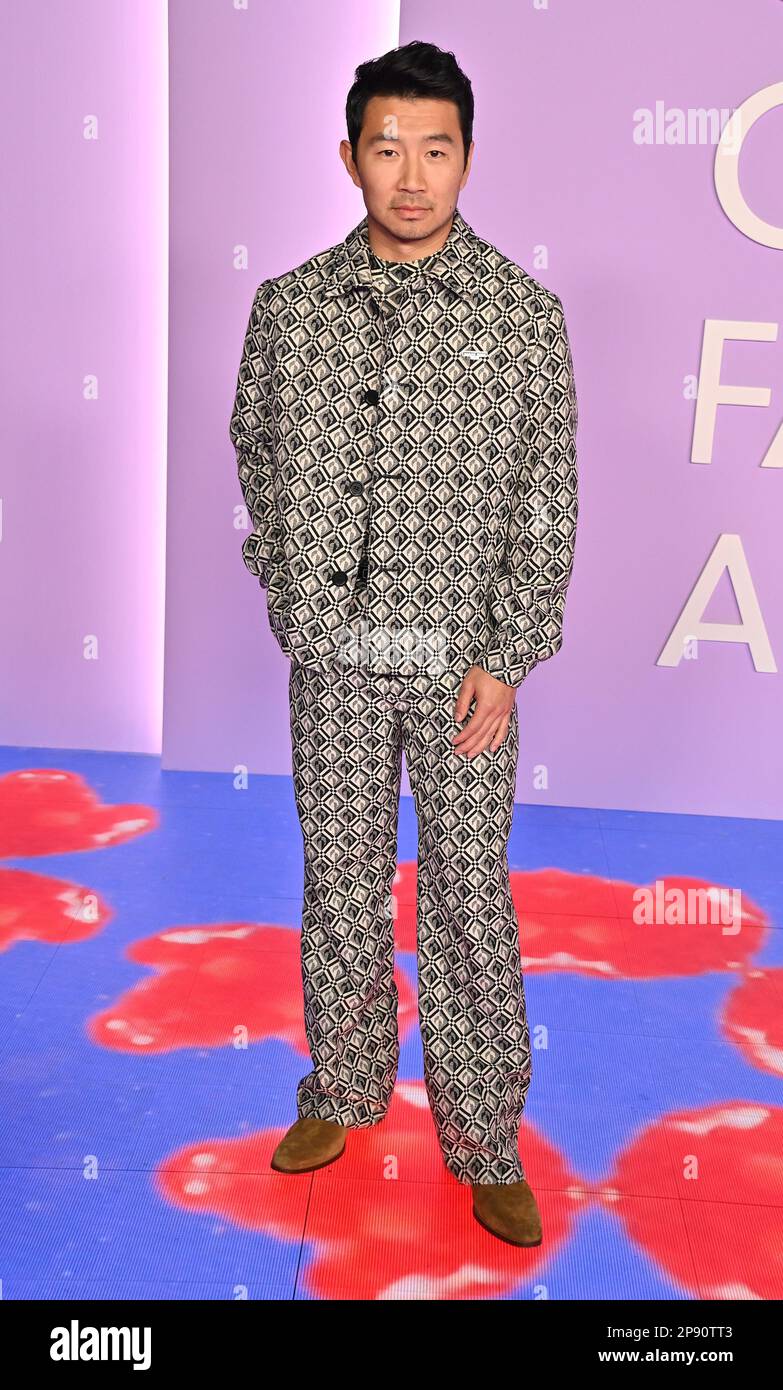 Hollywood, CA. March 9, 2023, Simu Liu arriving at the Green Carpet ...