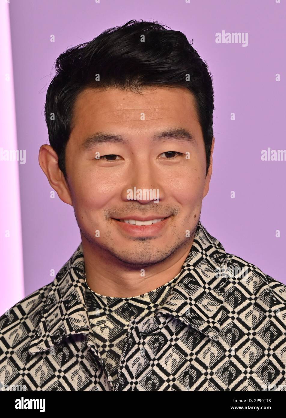 Hollywood, CA. March 9, 2023, Simu Liu arriving at the Green Carpet ...