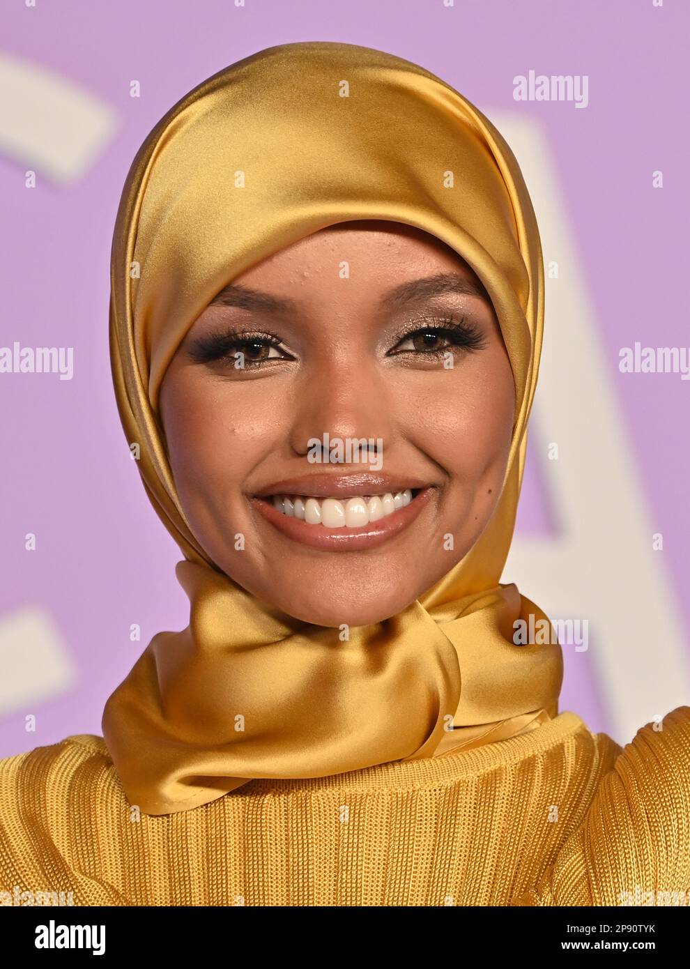 Hollywood, CA. March 9, 2023, Halima Aden arriving at the Green Carpet ...