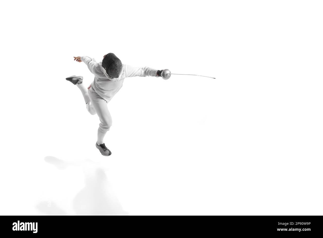 Full-length portrait of sportive man, professional fencer in fencing ...