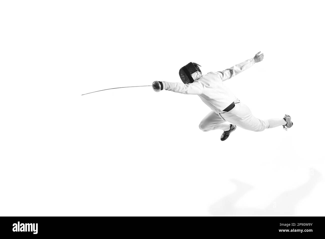 Full-length portrait of sportive man, professional fencer in fencing ...