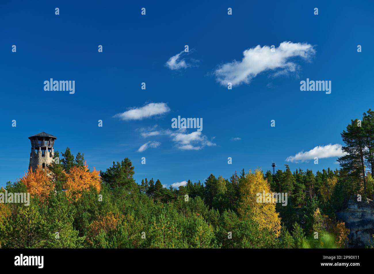 A stone lookout tower on a hill above a quarry in Józefów in Roztocze ...
