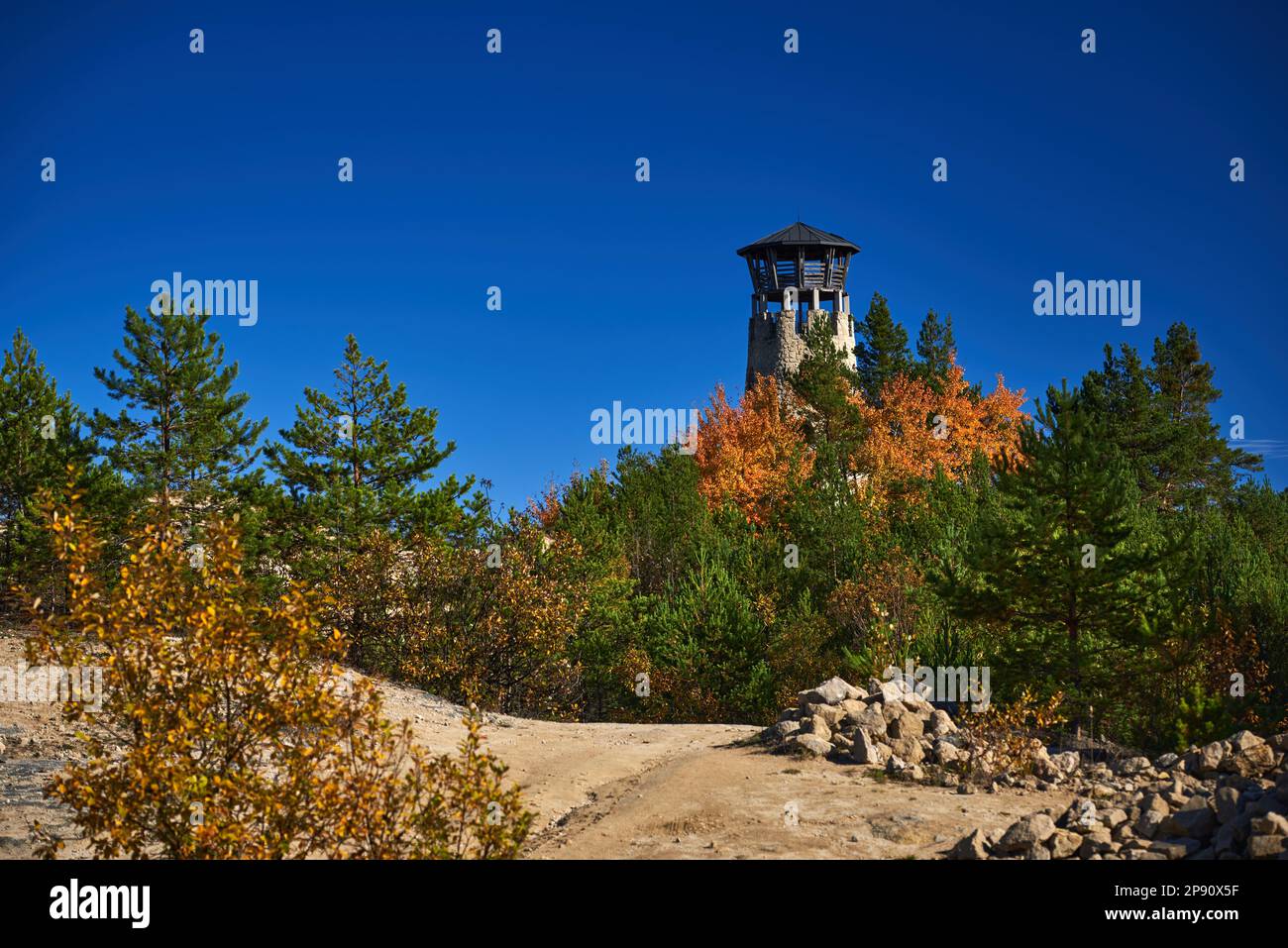 View of the stone lookout tower in the quarry located in Józefów in ...