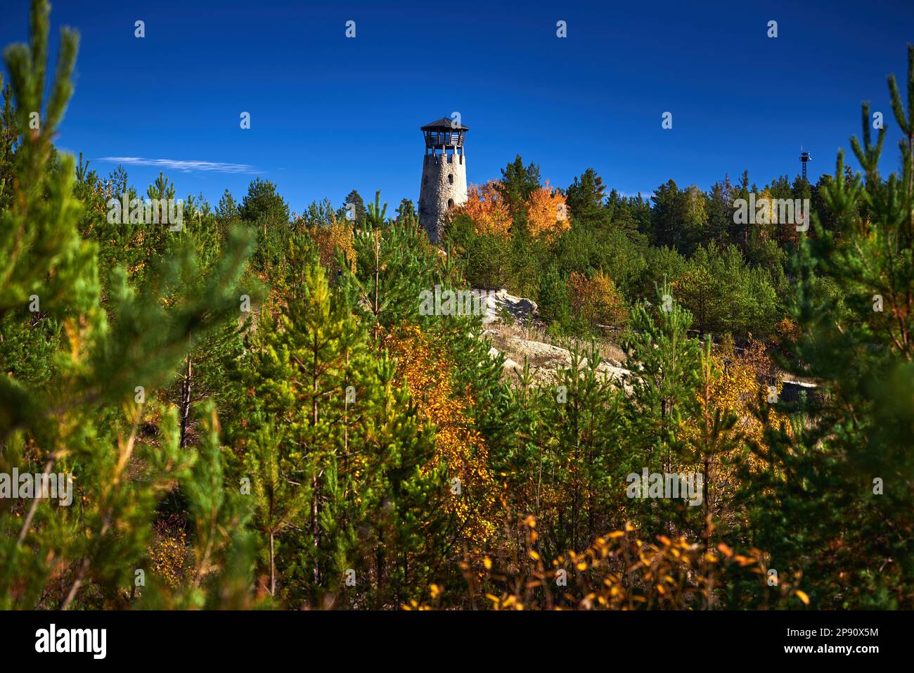 View of the stone lookout tower in the quarry located in Józefów in ...
