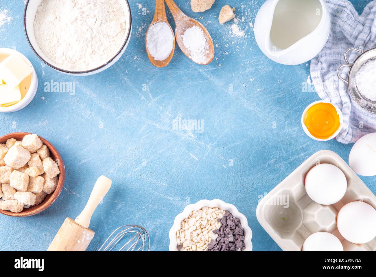 Baking ingredients background. Cooking ingredients (flour, eggs, milk ...