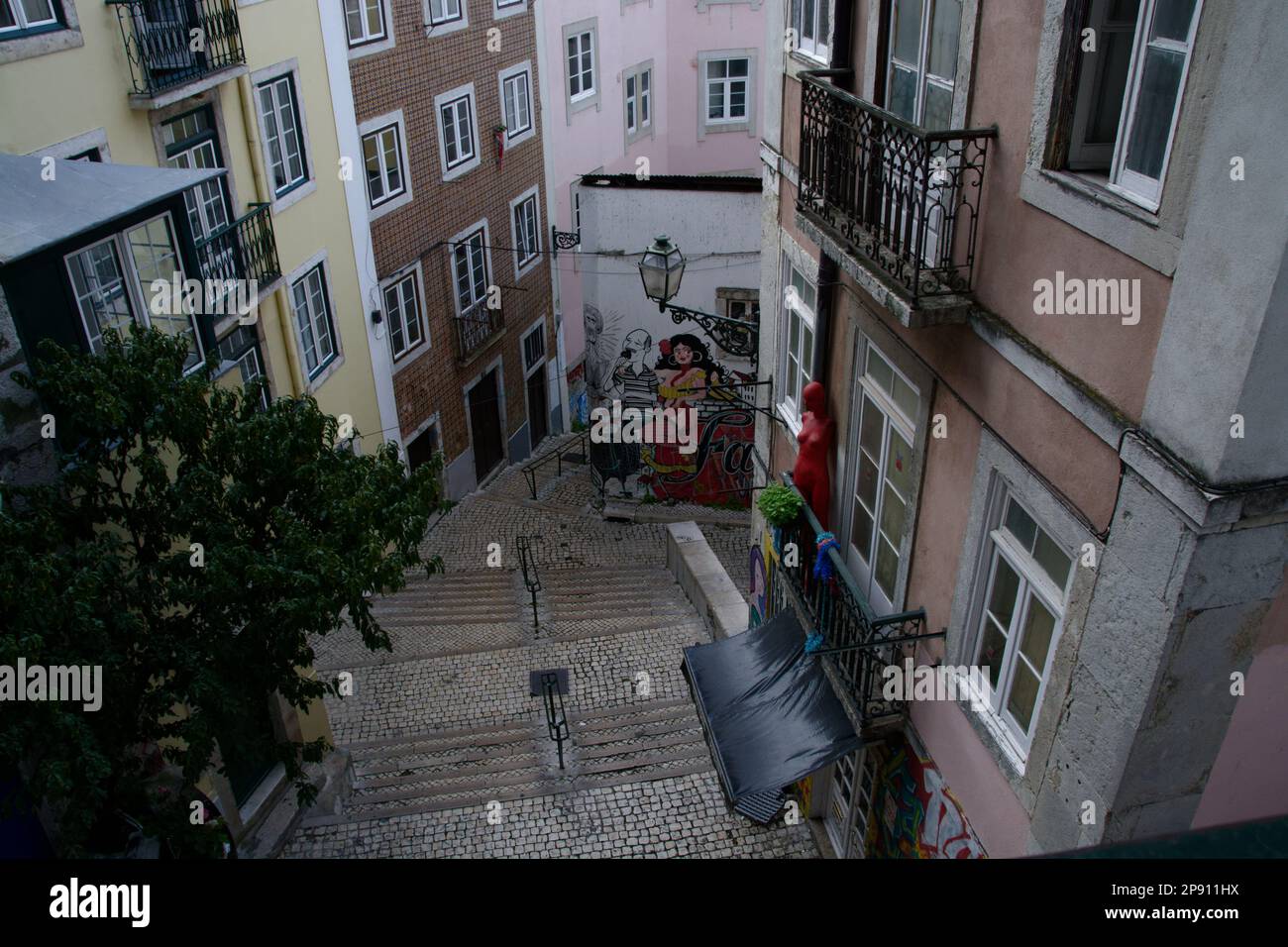 Lisbon Streets - steep, hillside streets with steps and graffitti ...