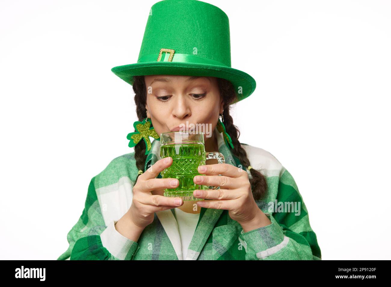 Beautiful woman drinking traditional Irish beverage for Saint Patrick's ...