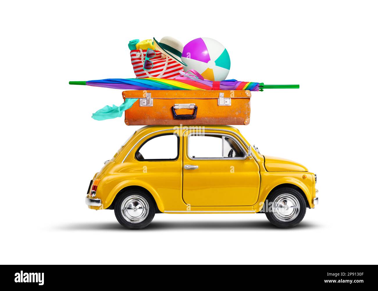 Retro yellow car with luggage and beach equipment on the roof Stock ...