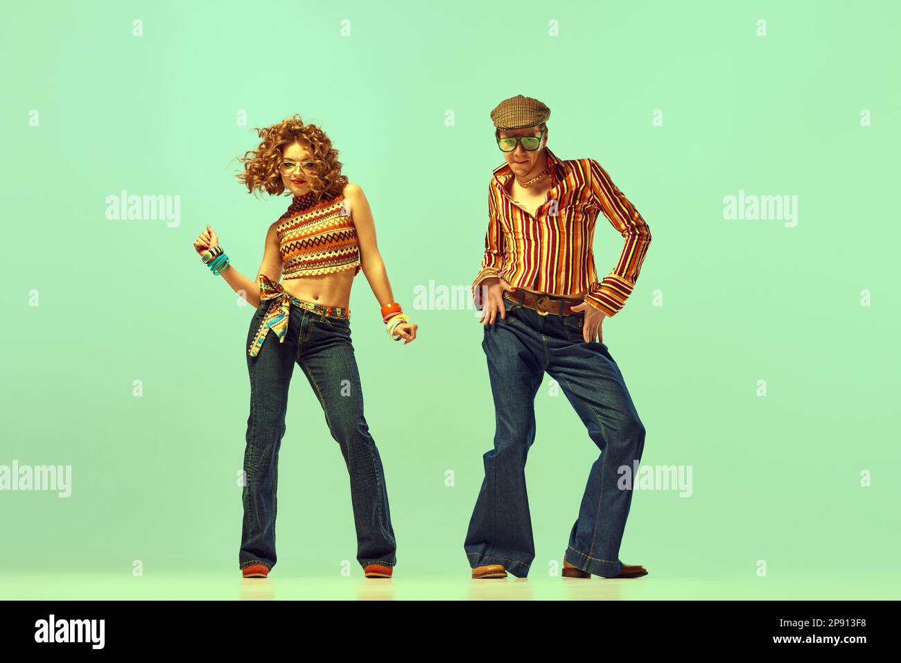 Incendiary dance. Emotional man and woman in retro style clothes ...