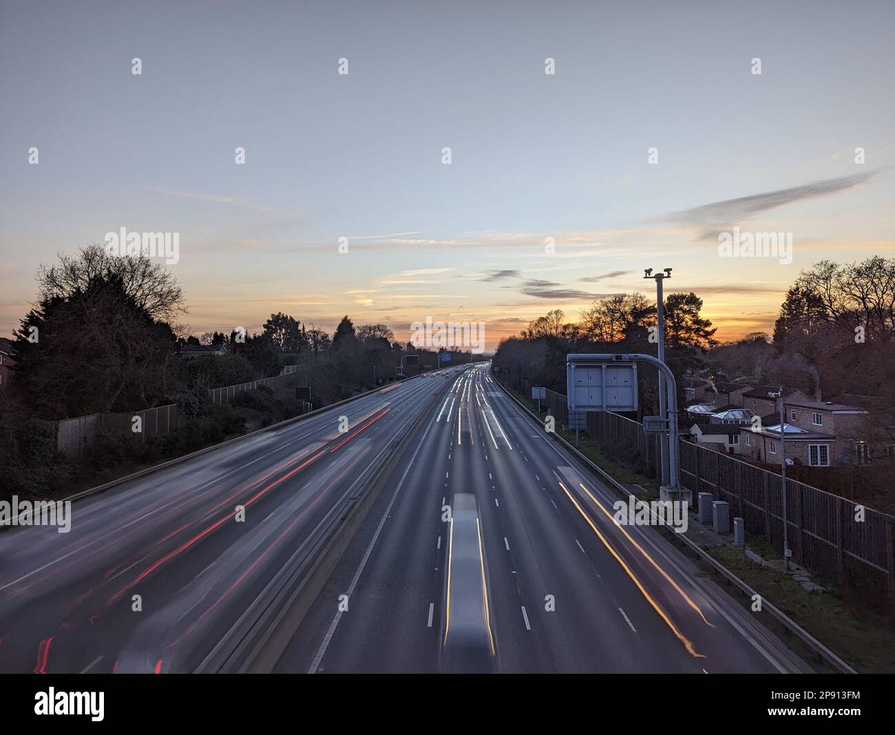 A view of traffic flowing along the M3 motorway between junctions 3 and ...