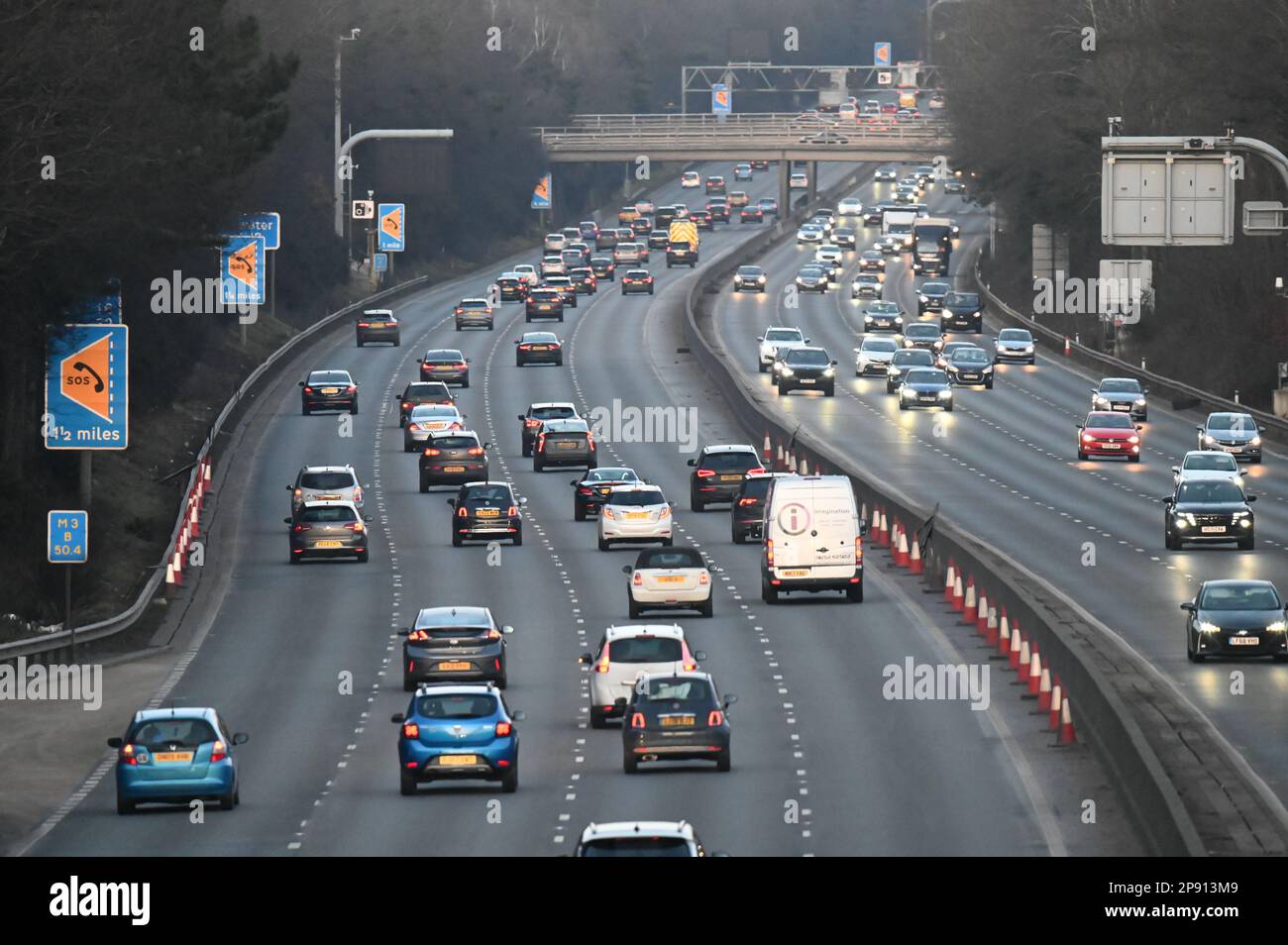 A view of traffic flowing along the M3 motorway between junctions 3 and ...