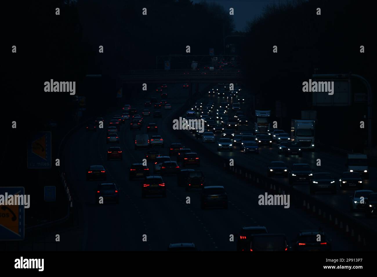 A nocturnal view of traffic travelling along the M3 motorway between ...