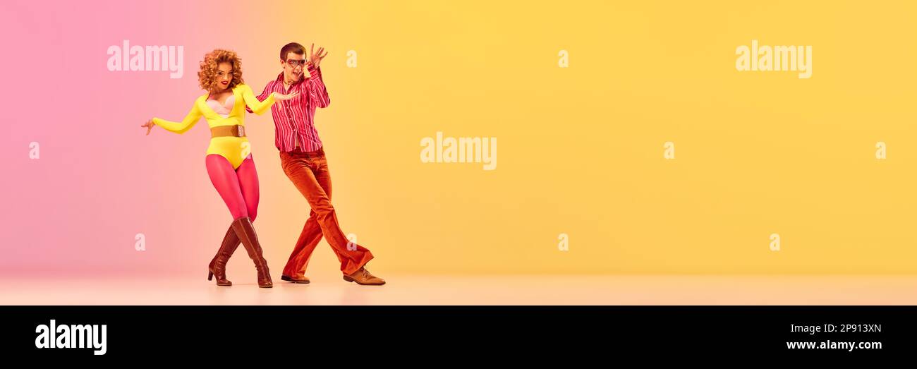 Stylish expressive excited couple of professional dancers in retro ...