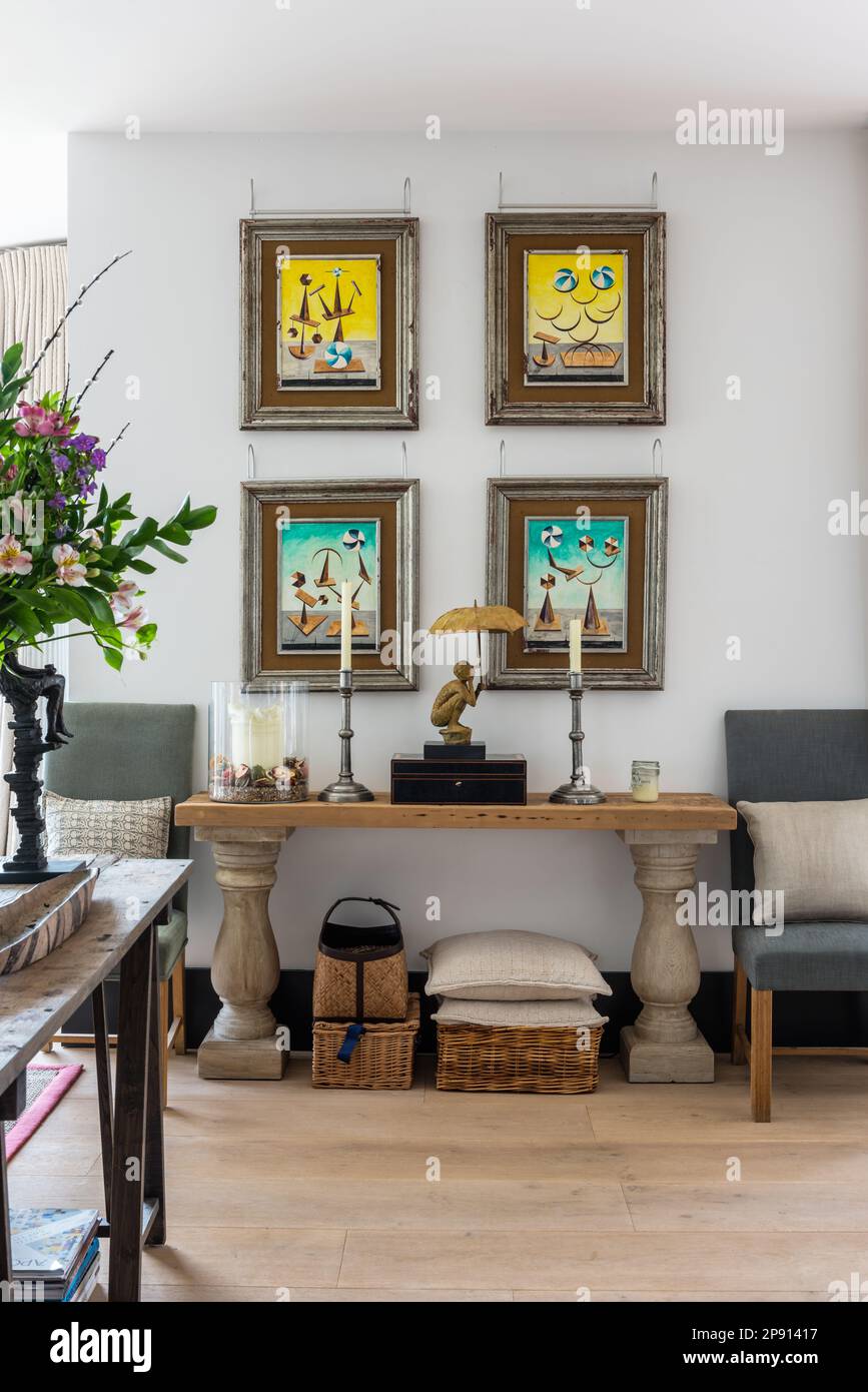 Abstract art above console in newly built Cotswolds home Stock Photo ...