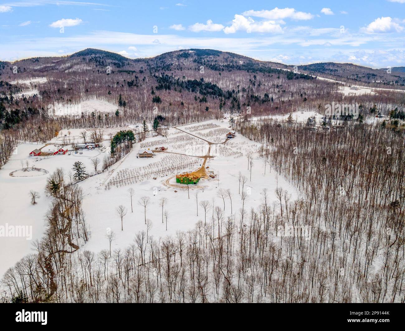 An aerial view of a unique custom home with rustic and modern design ...