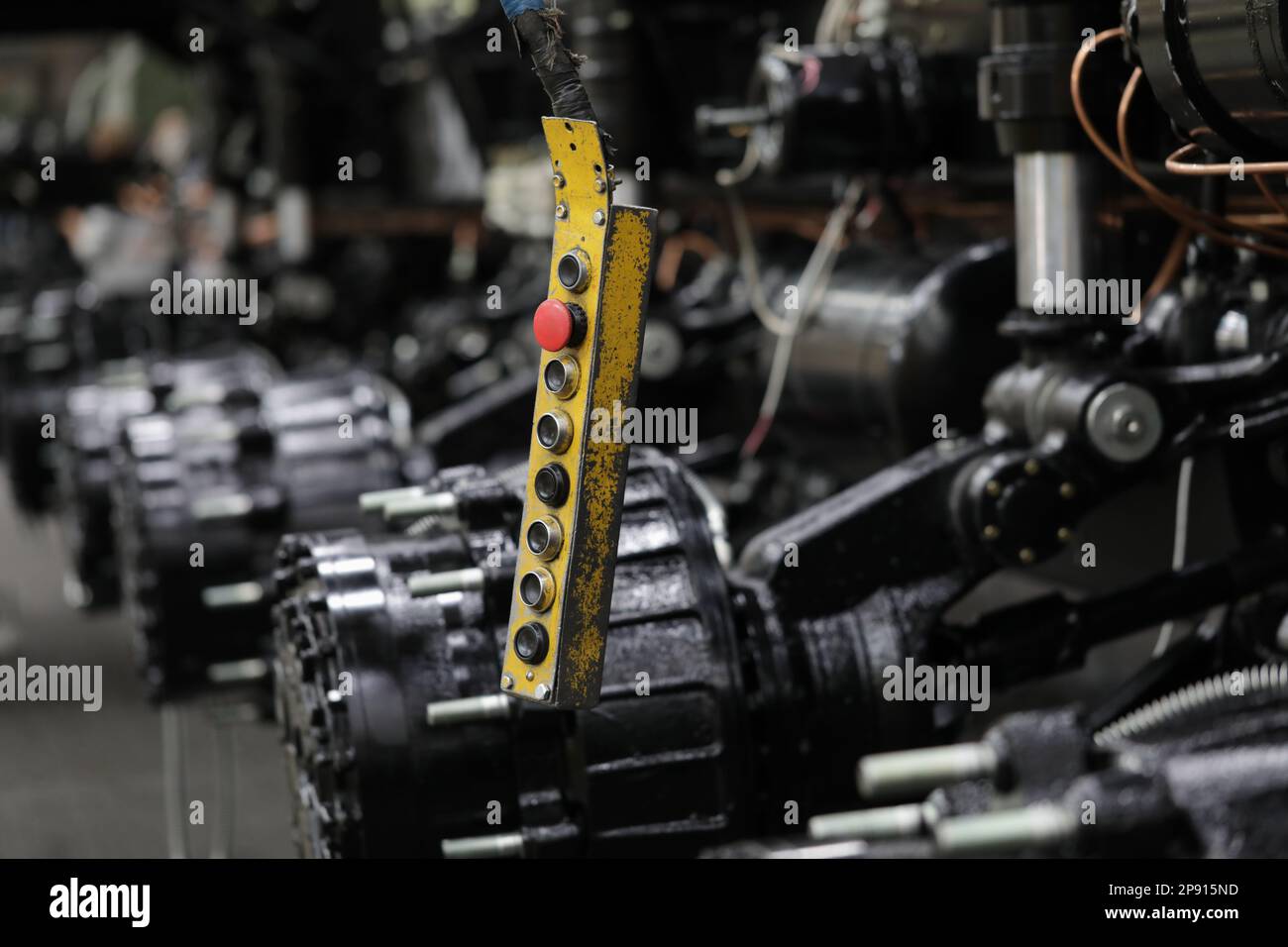 Control panel with buttons in production of car parts and engines Stock ...