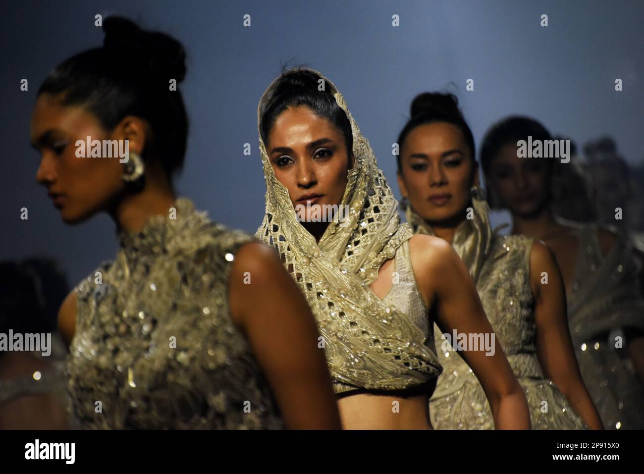 Mumbai, Maharashtra, India. 10th Mar, 2023. Fashion models walk in a ...