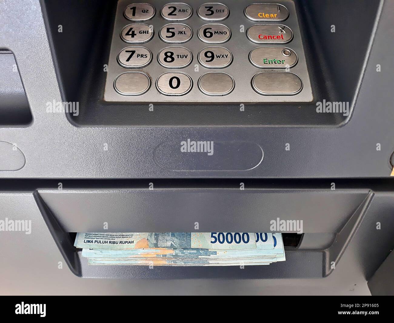 Close up the atm machine number buttons for money withdraw with ...