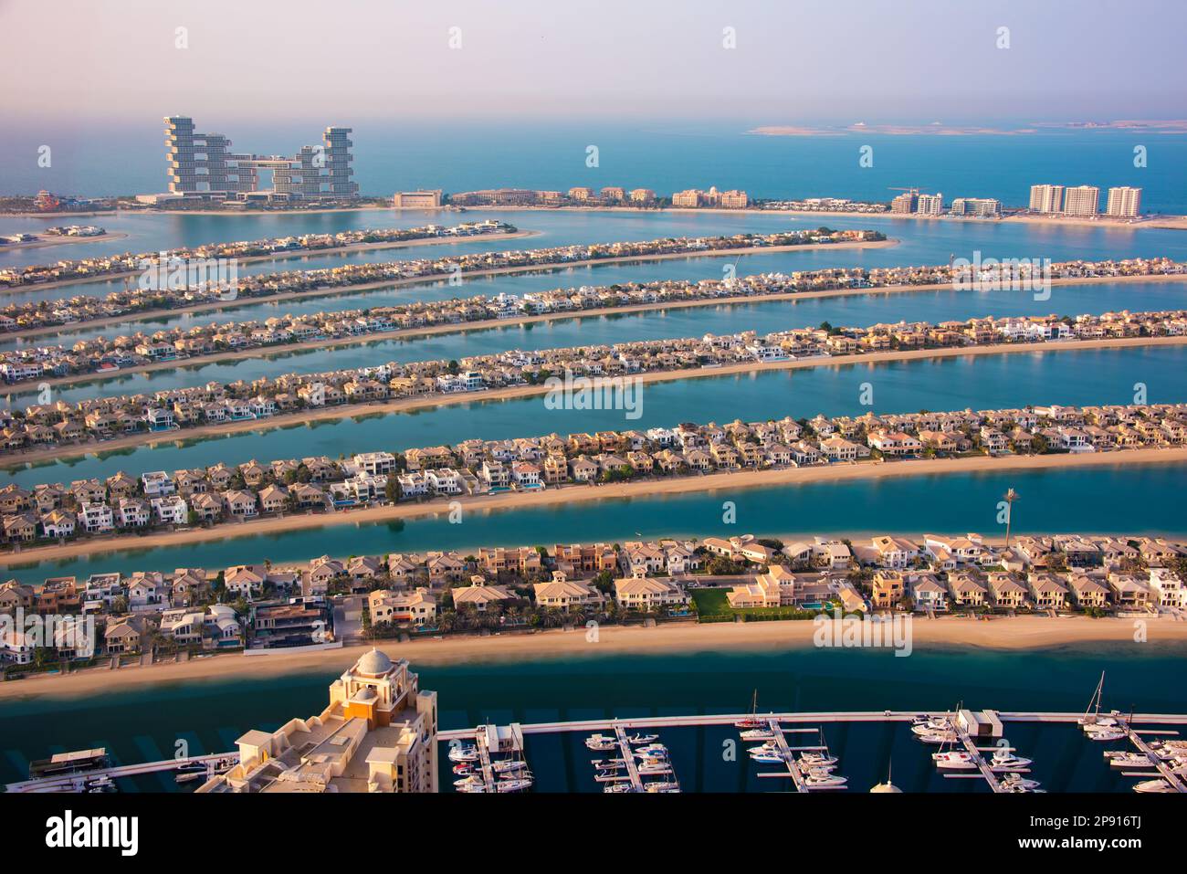 Palm Jumeirah island in Dubai on sunset, modern architecture, beaches ...