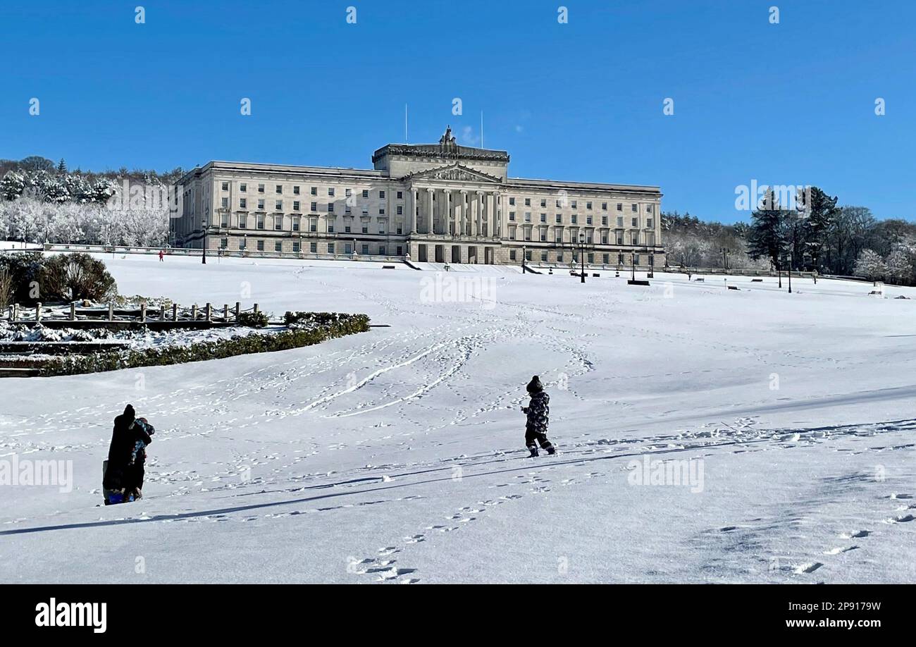 People enjoy the snow at Stormont estate in Belfast, Northern Ireland ...