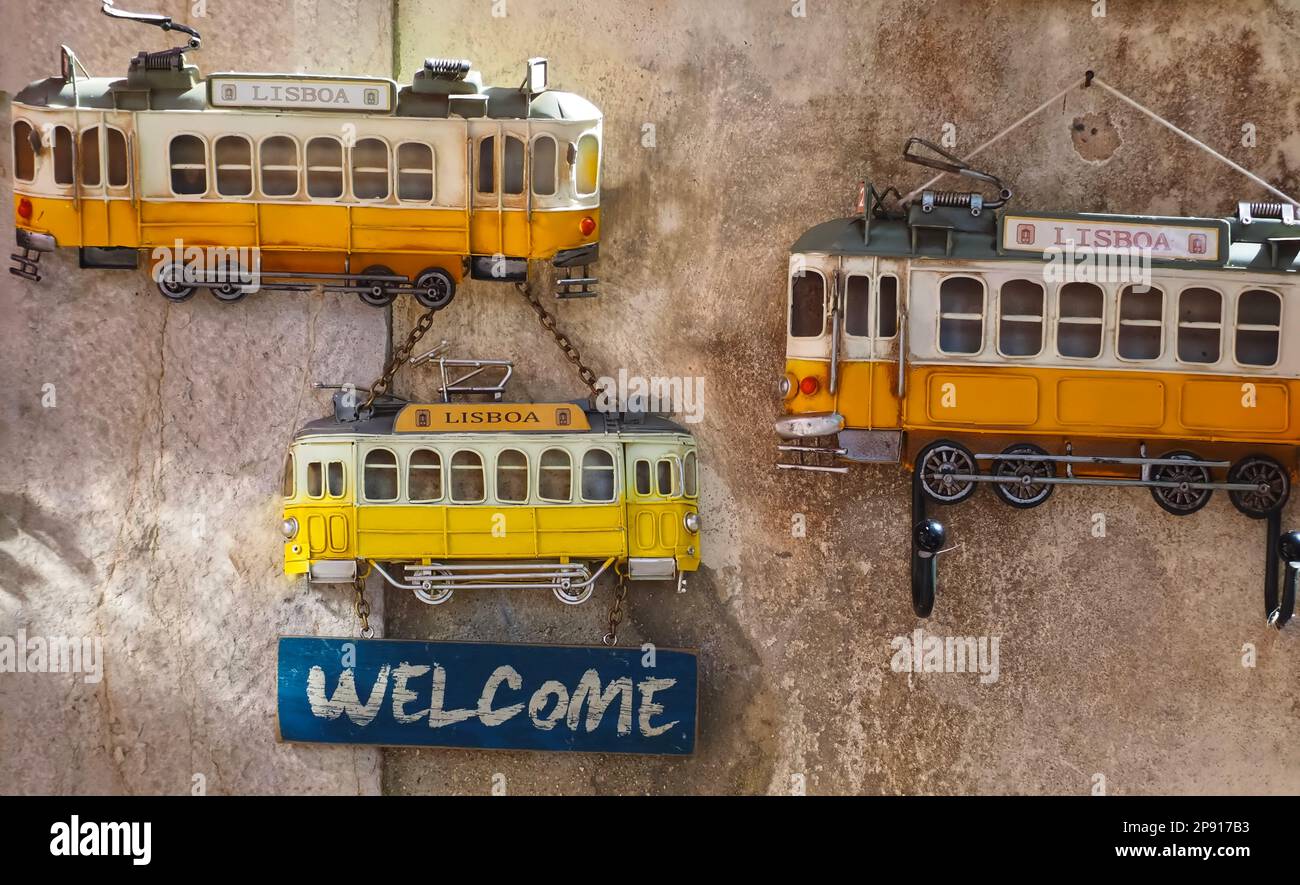 Cute tiny tram souvenirs of Lisbon Stock Photo - Alamy