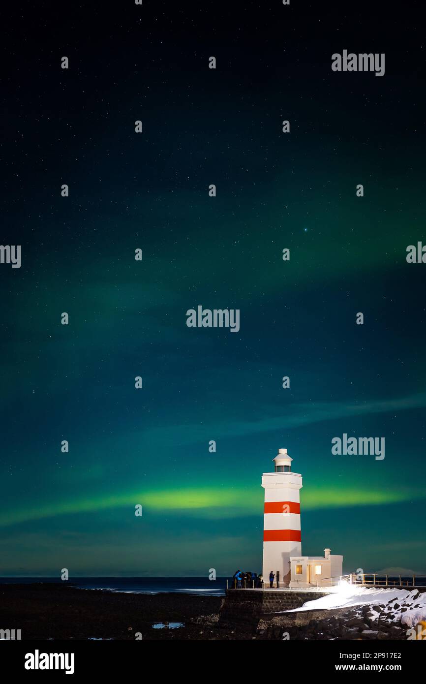 Northern Lights, or Aurora Borealis, display at Gardur Lighthouse ...