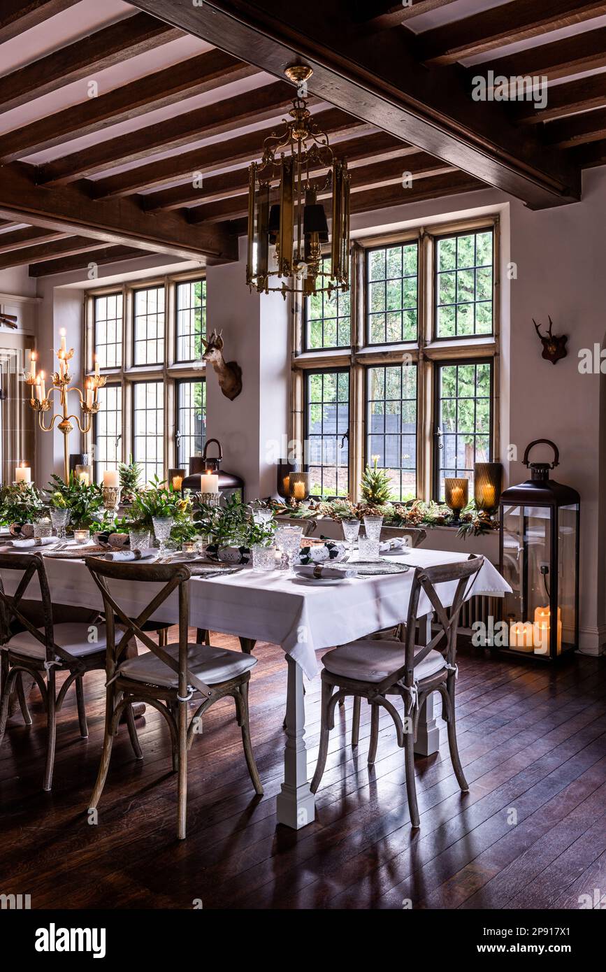 Christmas dining table with leaded glass windows in Arts and Crafts ...