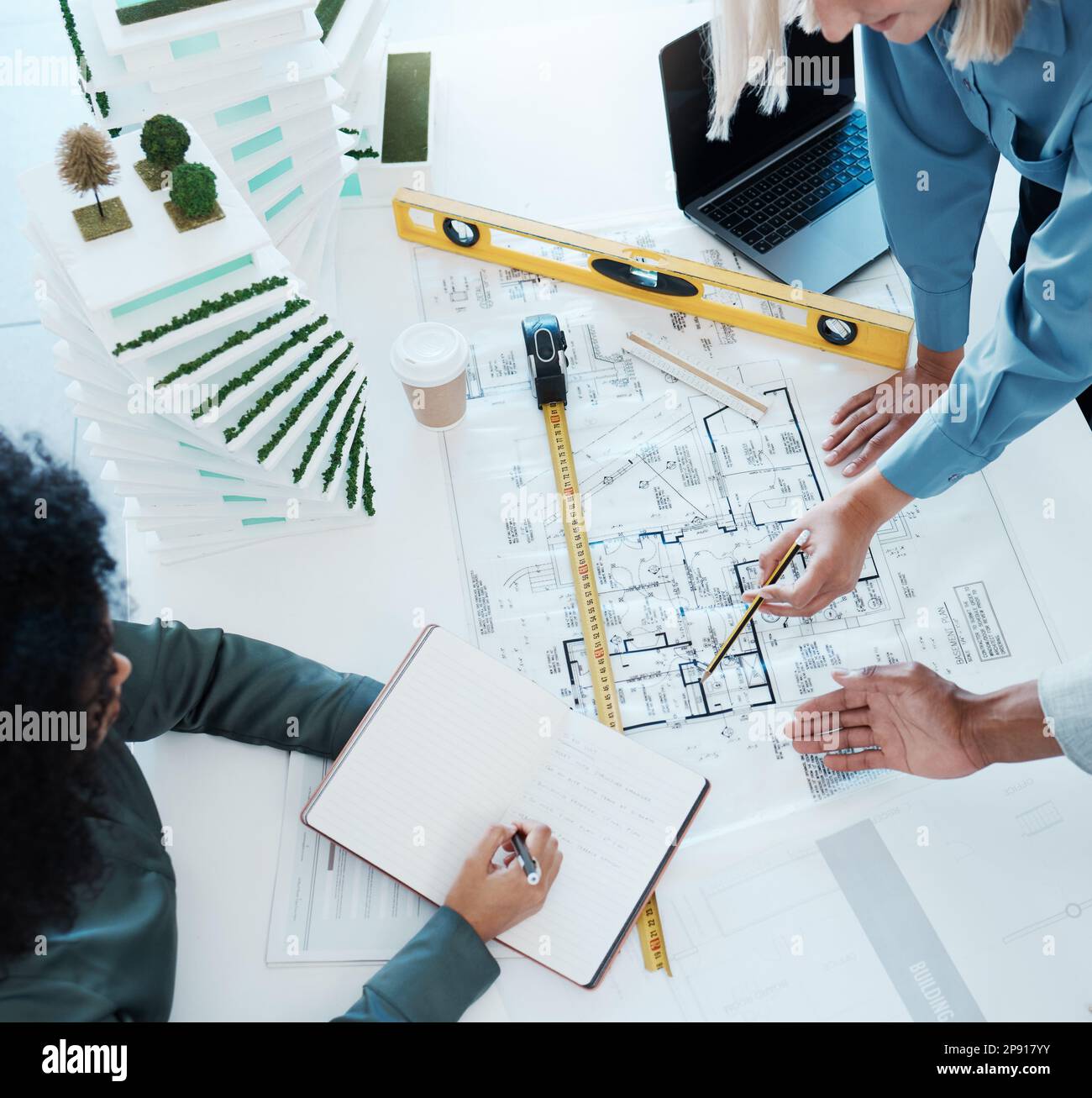Architect, paper and blueprint with meeting, planning and woman with ...