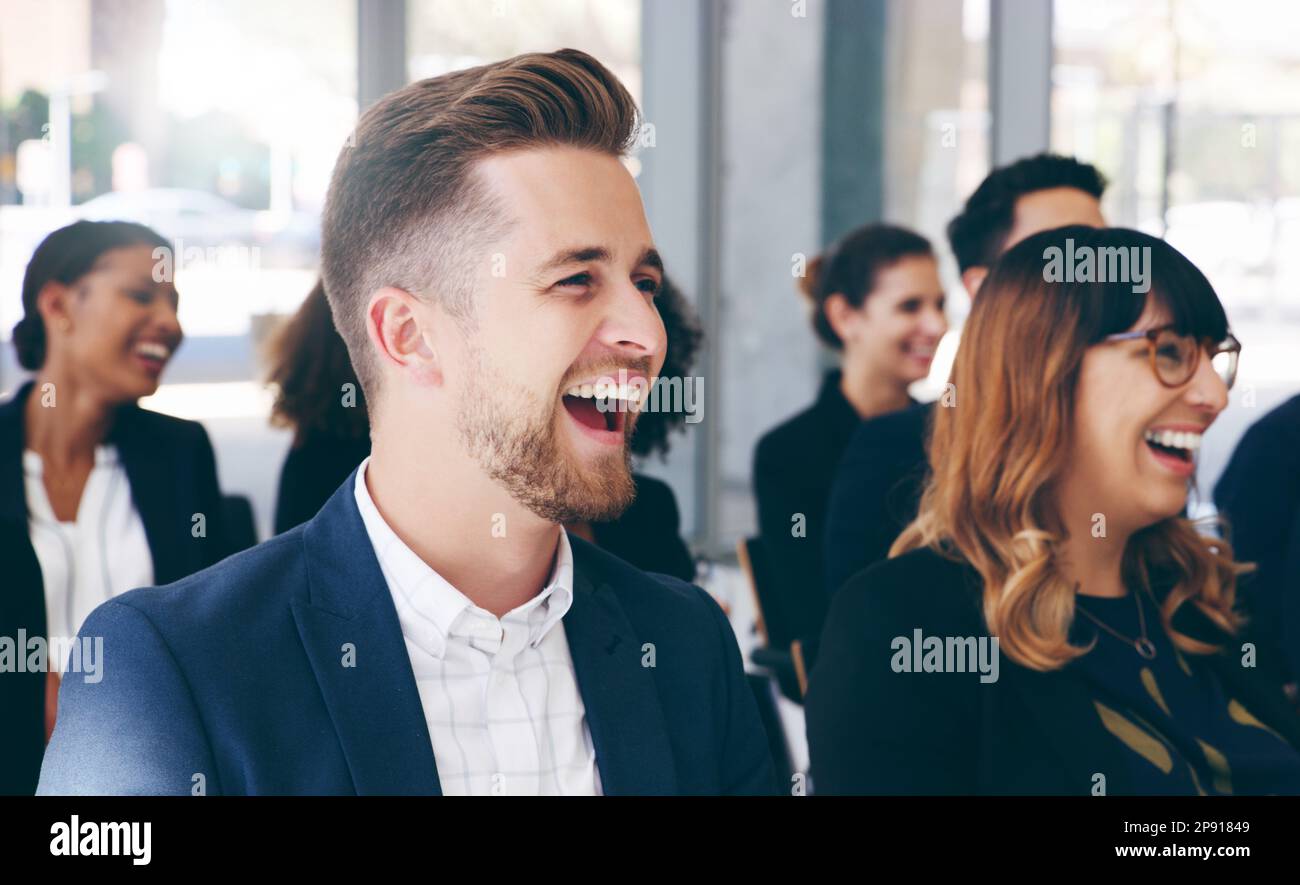 Work laughing attending hi-res stock photography and images - Alamy