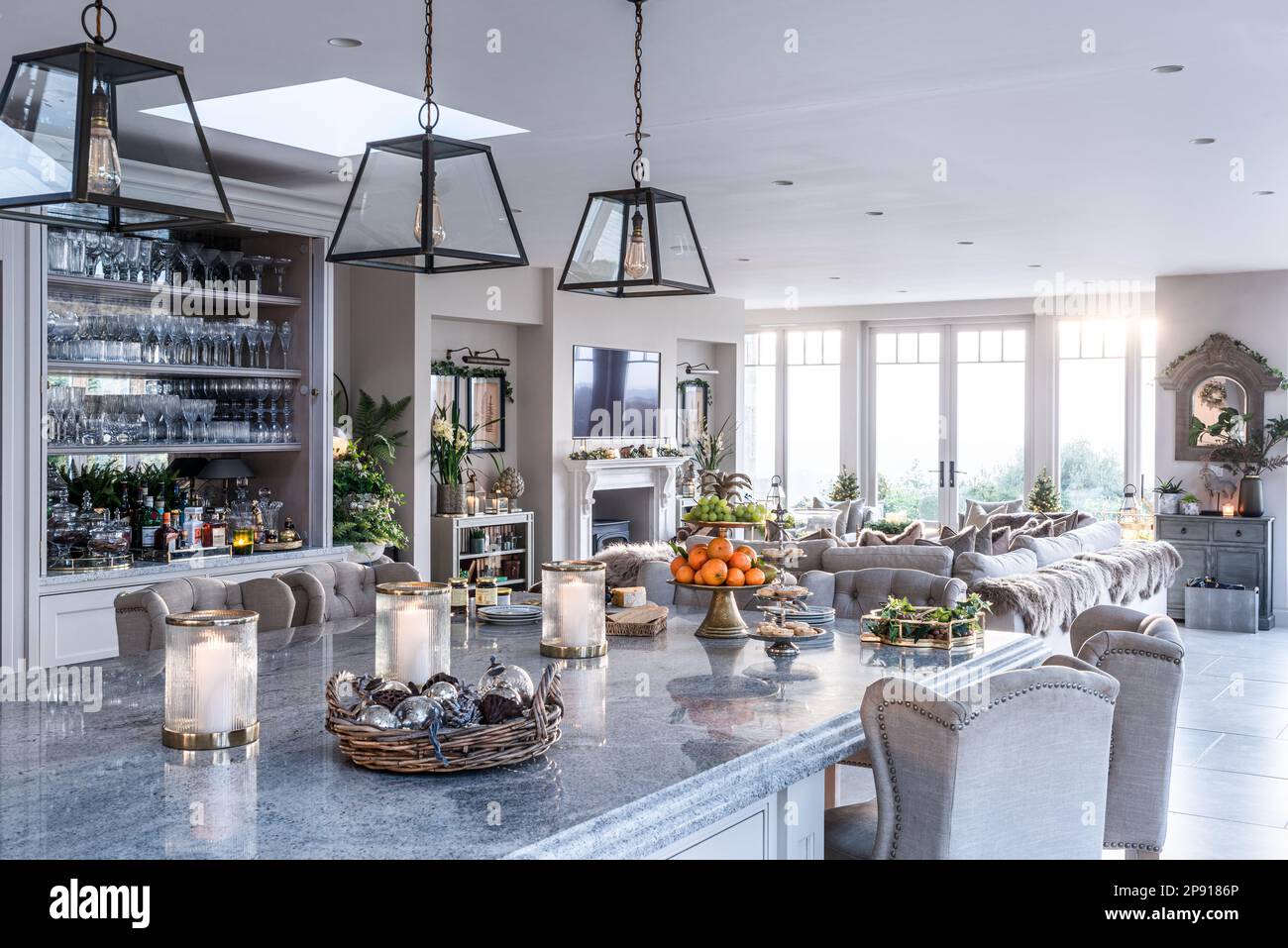 Open plan living room and kitchen in Arts and Crafts style country ...