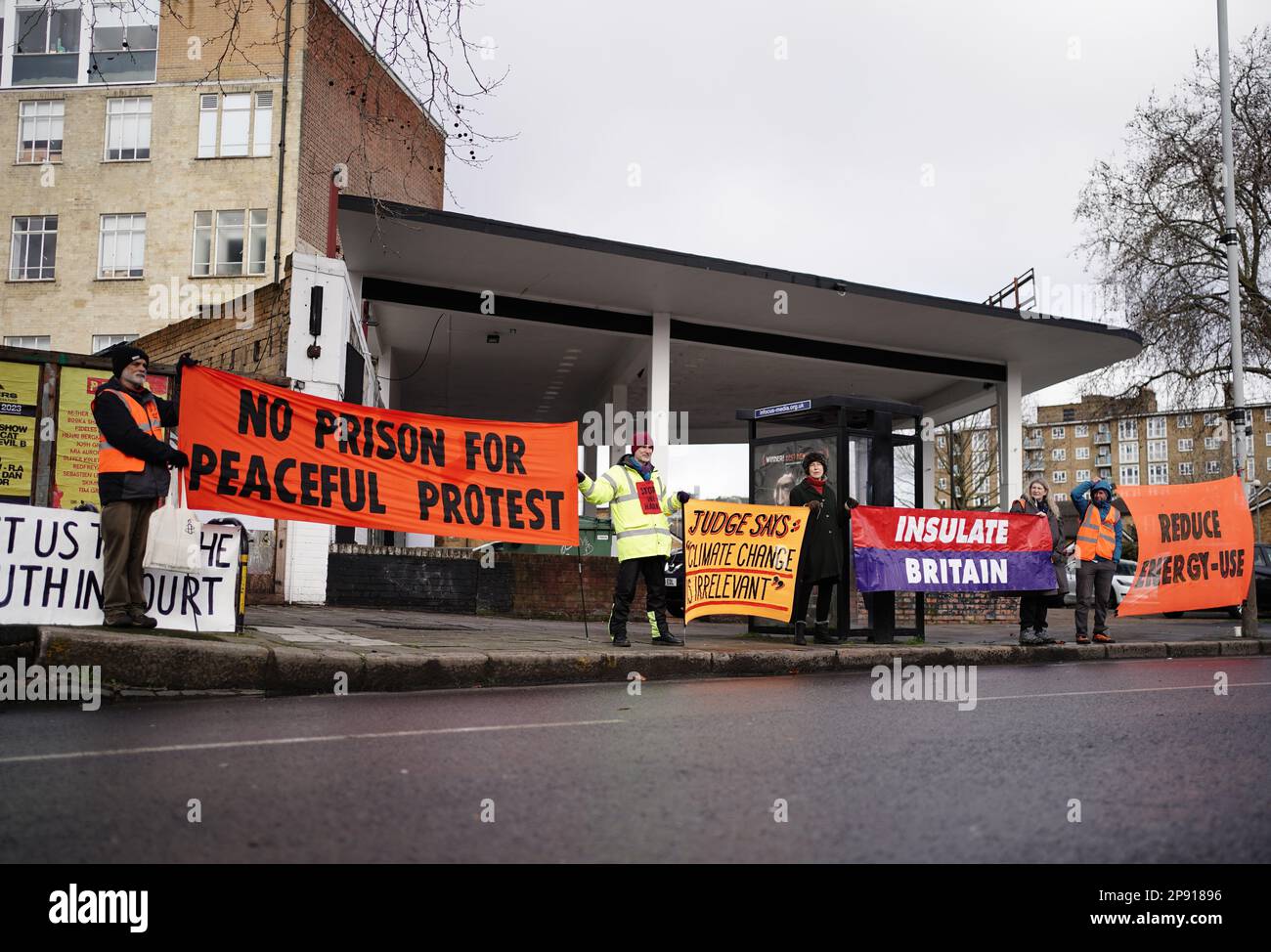 Insulate Britain supporters protest near Inner London Crown Court ...