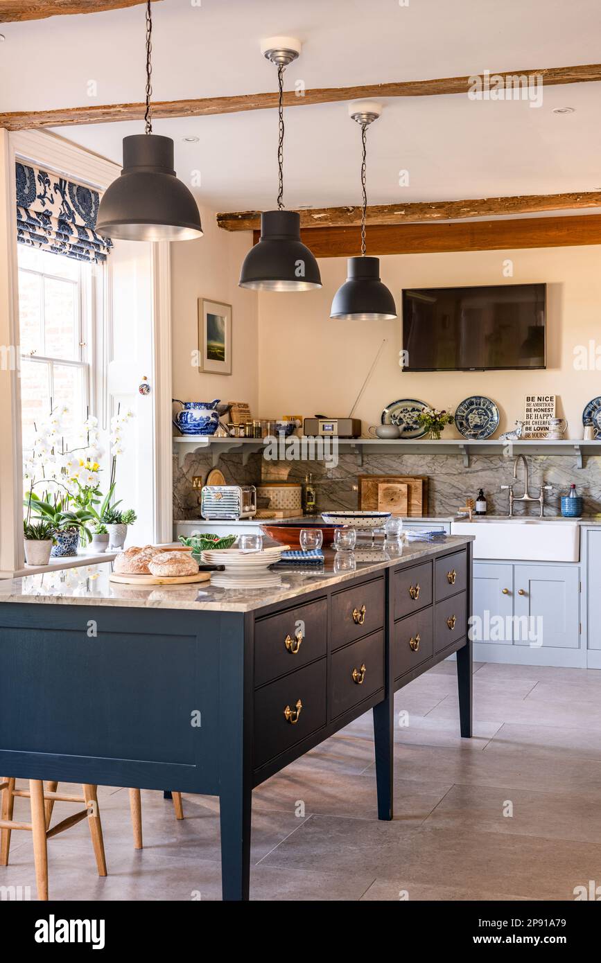 Pendant lamps above island unit painted in 'Kigali' with porcelain ...