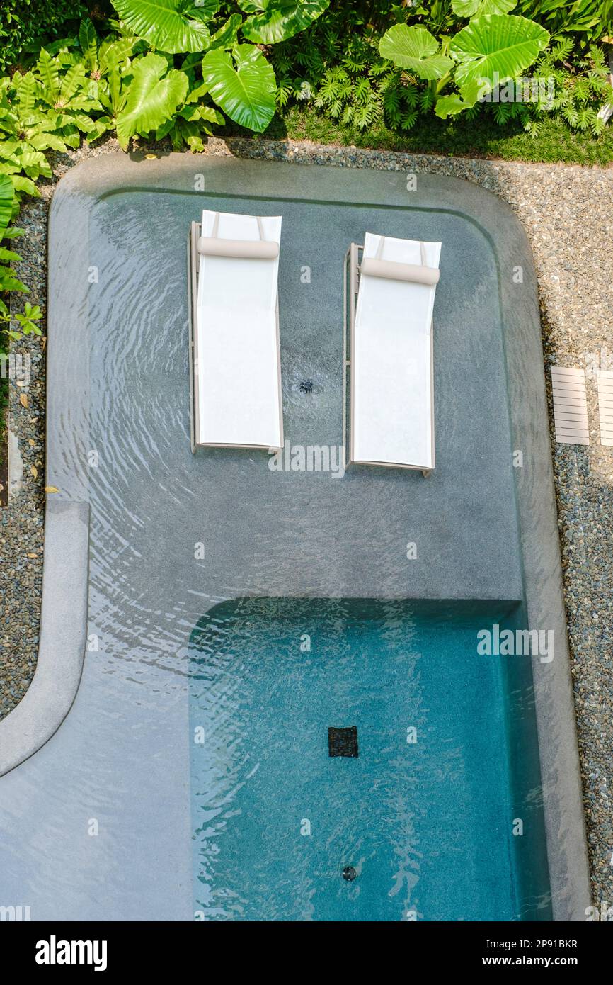 swimming pool at an art deco luxury hotel architecture from the 80s ...