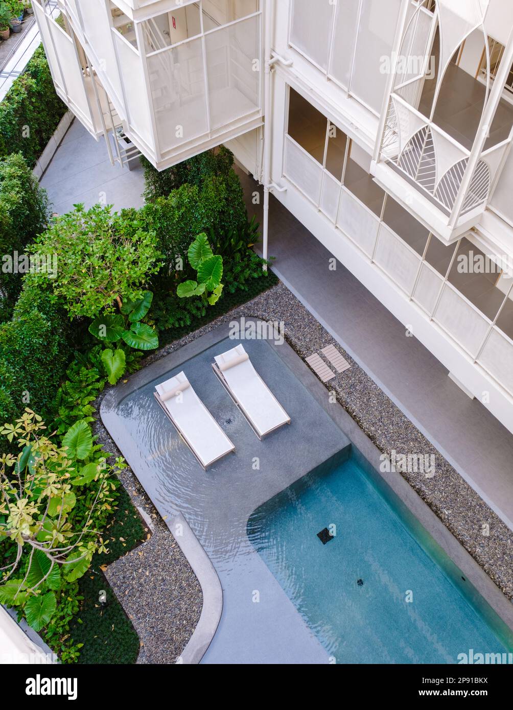 swimming pool at an art deco luxury hotel architecture from the 80s ...