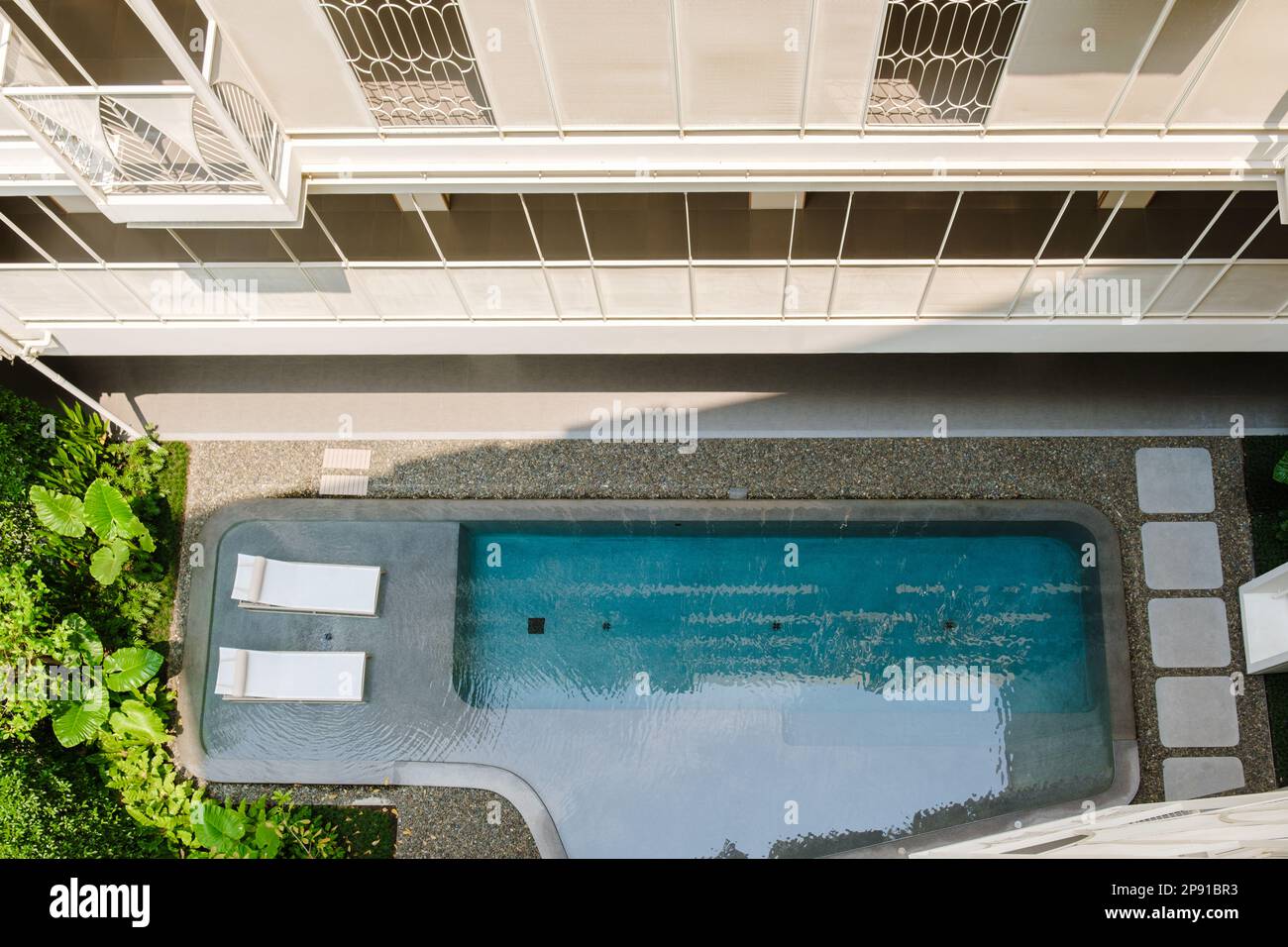 swimming pool at an art deco luxury hotel architecture from the 80s ...