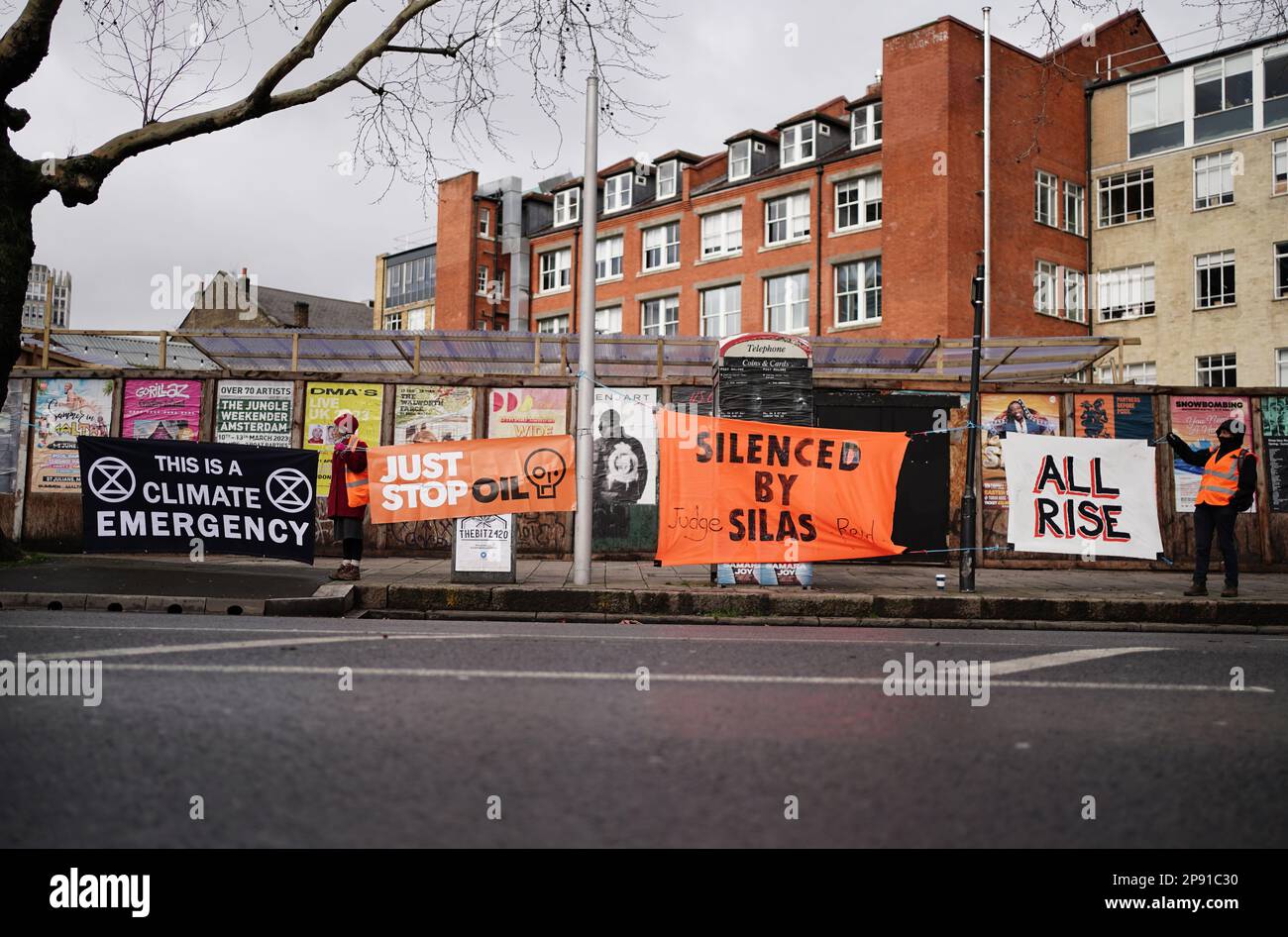 Insulate Britain supporters protest near Inner London Crown Court ...