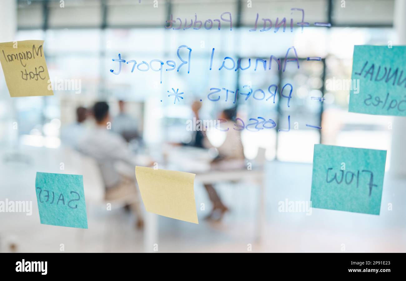 Business meeting and schedule planning with sticky notes on workflow ...