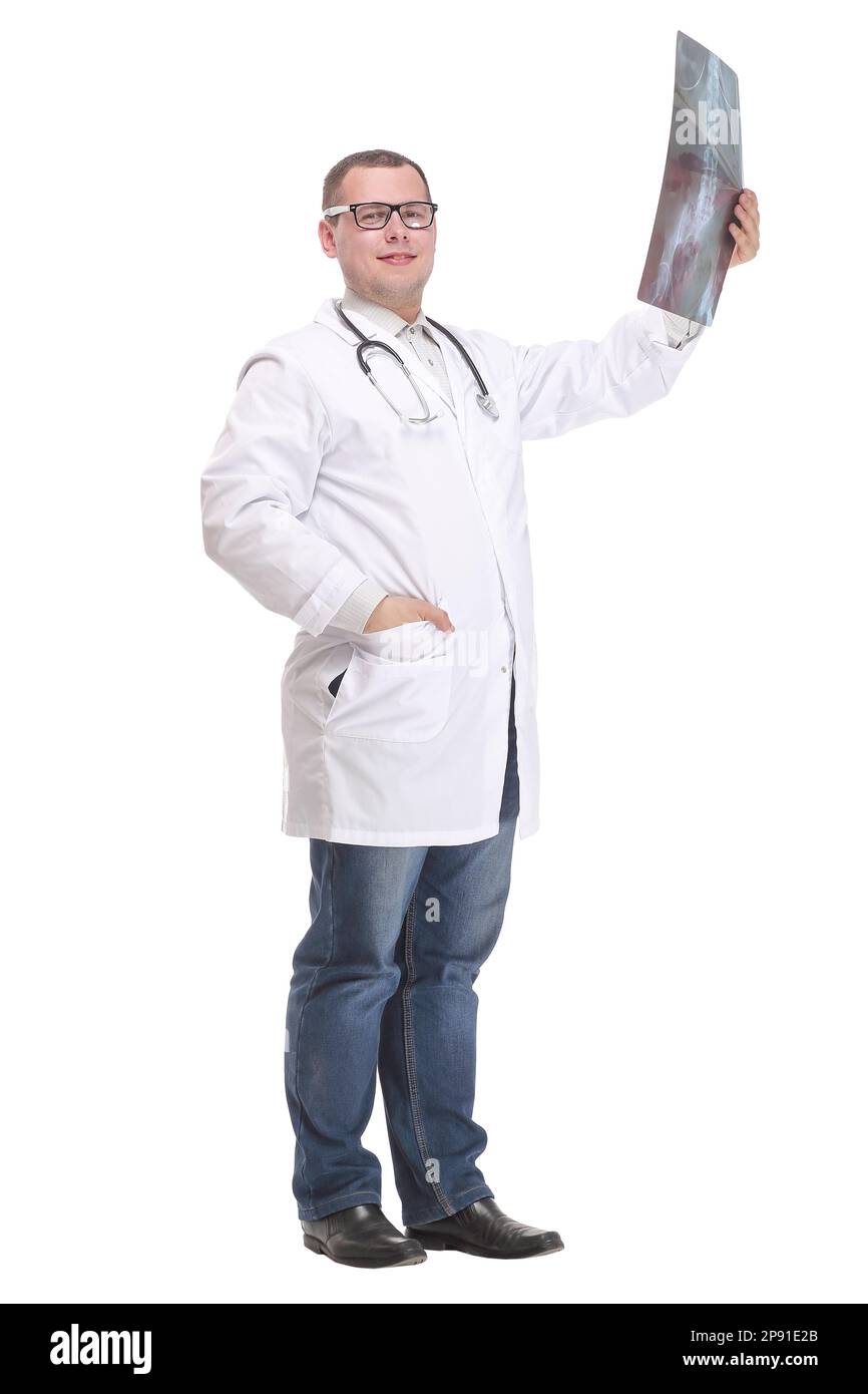 Side view of attractive doctor examining an x-ray and looking at the ...