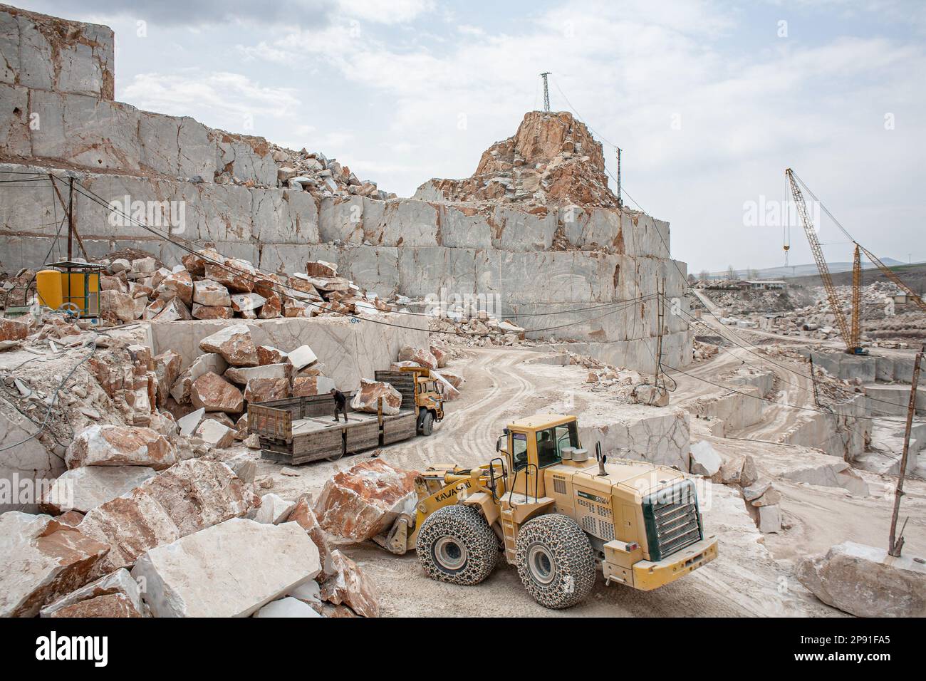 Workers guide operators during the transportation process. The quarries ...