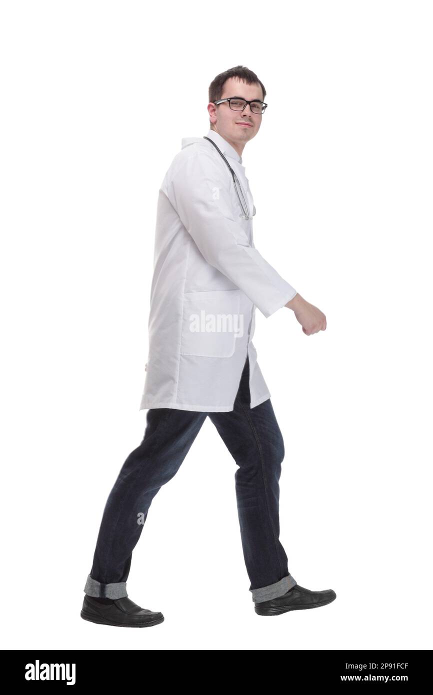 Male doctor walking isolated over a white background -side view Stock ...