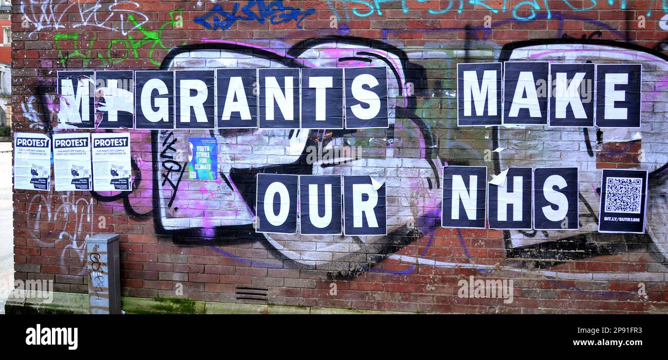 'Migrants make our NHS' sign, flyposted on a wall in Manchester, UK ...