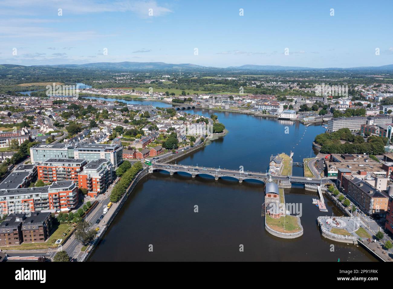 Aerial view of Limerick city center with Shannon river in the middle ...