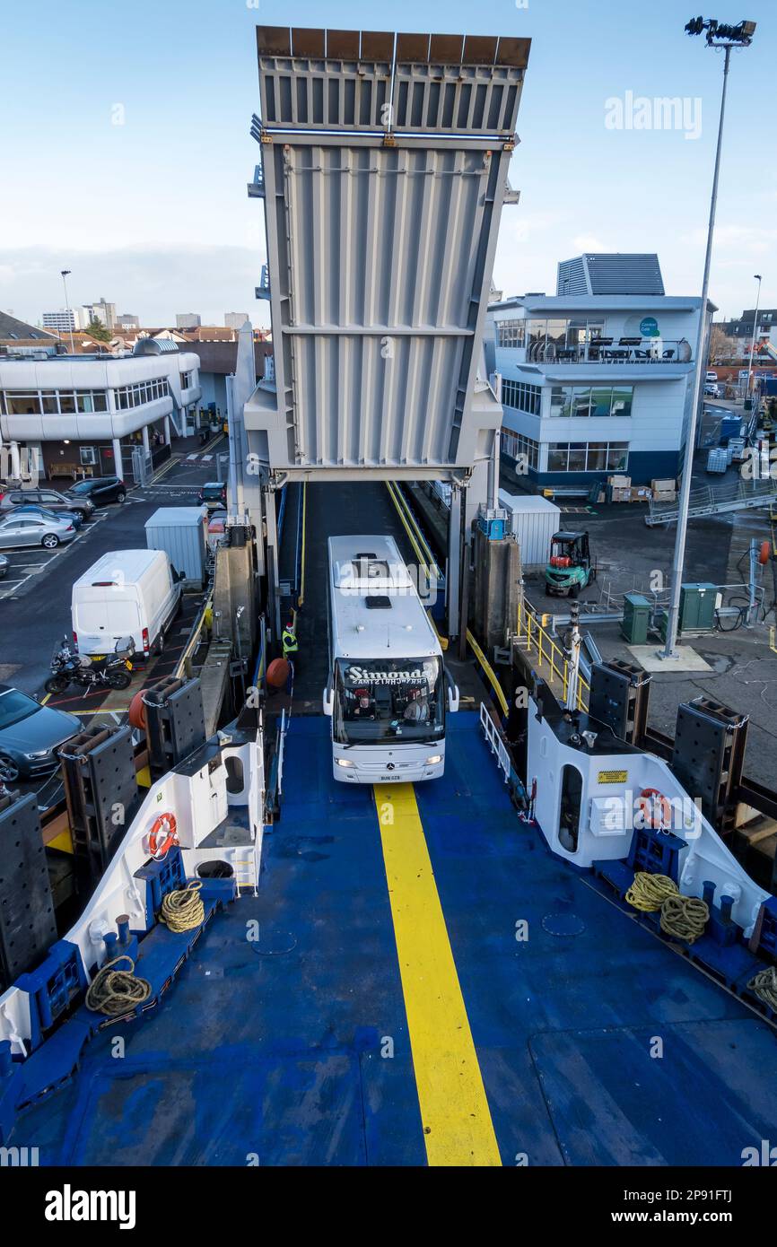 Tour bus boarding Wightlink ferry St Faith, Wightlink dock, Portsmouth ...