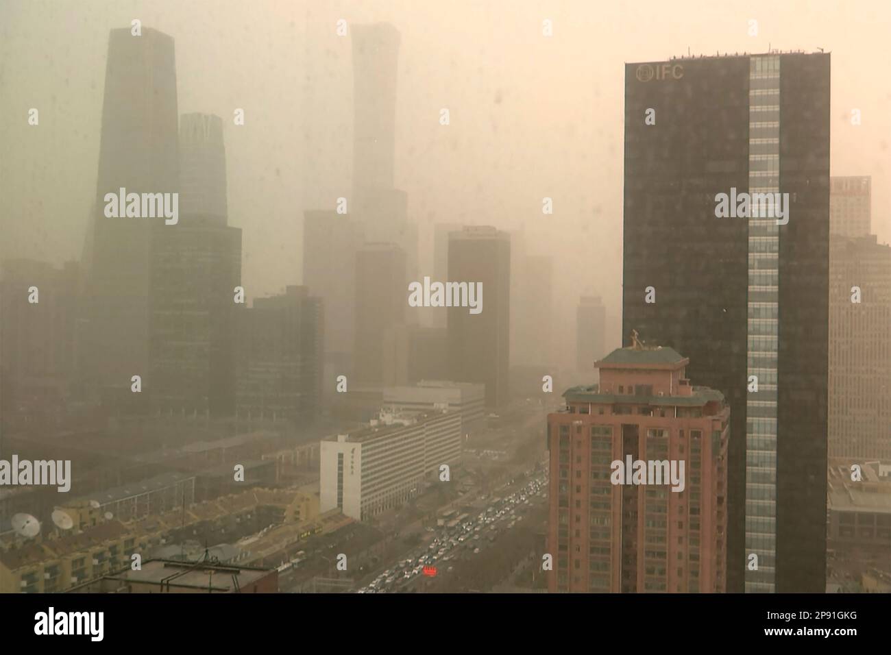 A view of the central business district shot through a glass window ...