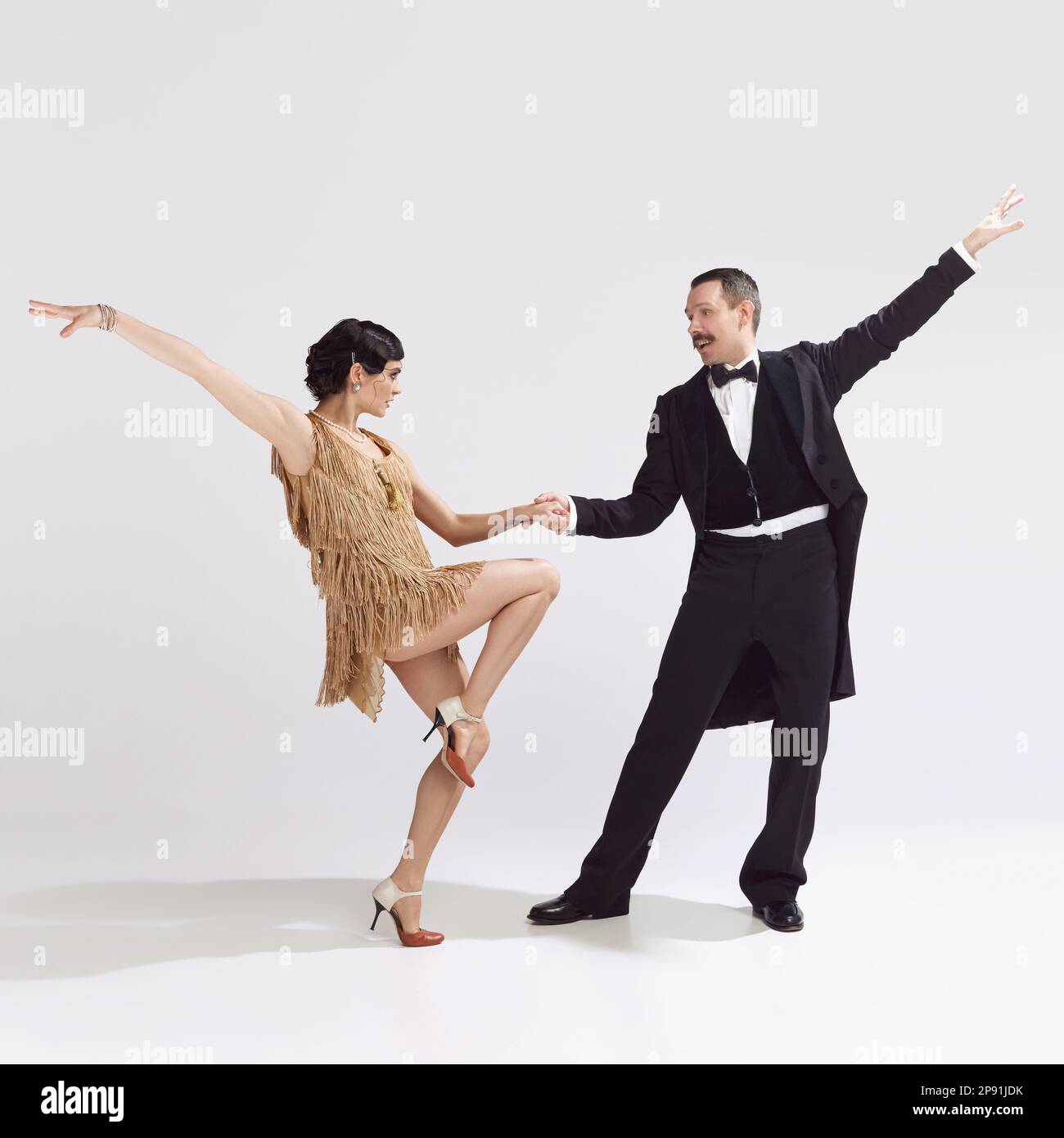 Passion. Elegant couple of dancers in vintage evening dress and suit ...