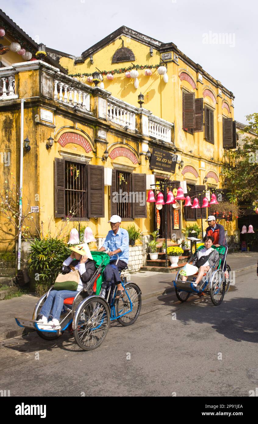 Vietnam, Hoi An, cyclos, tourists Stock Photo - Alamy