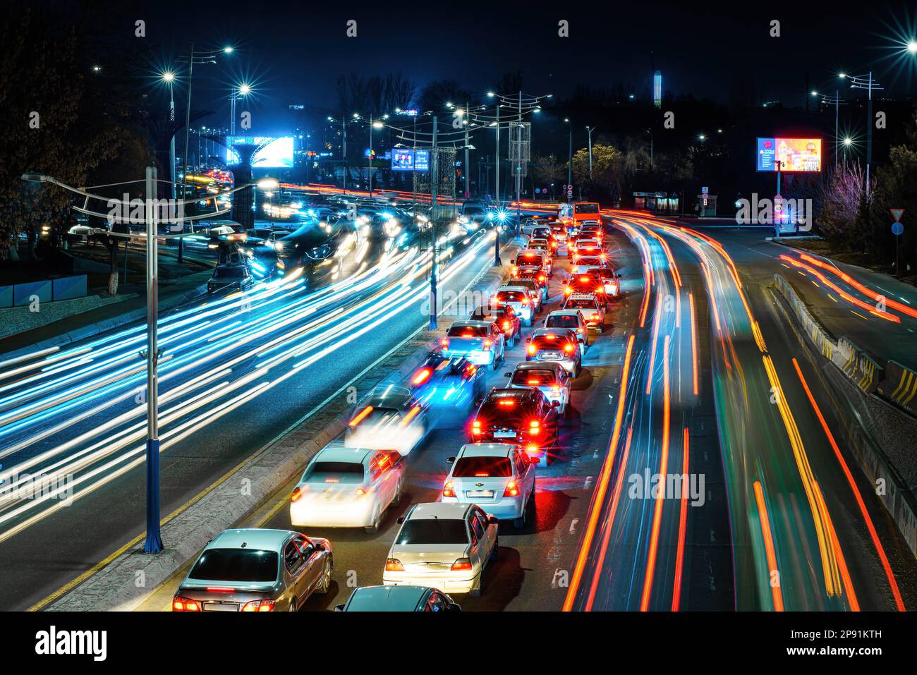 Car traffic light at night city highway Stock Photo - Alamy